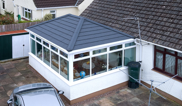 EDWARDIAN HIPPED BACK SOLID ROOF CONSERVATORY